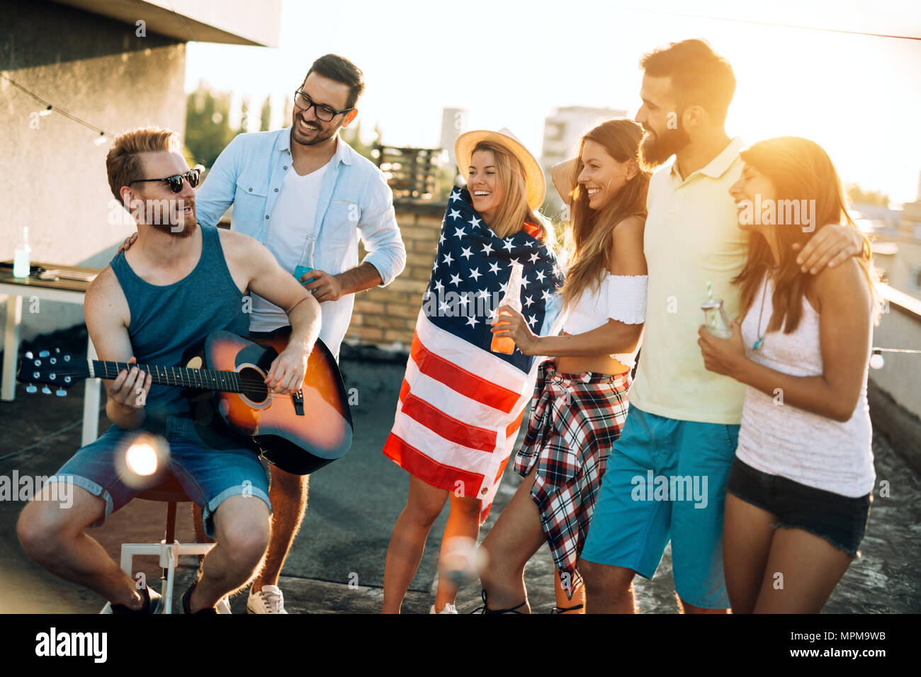 Happy friends laughing and smiling outdoors Stock Photo - Alamy