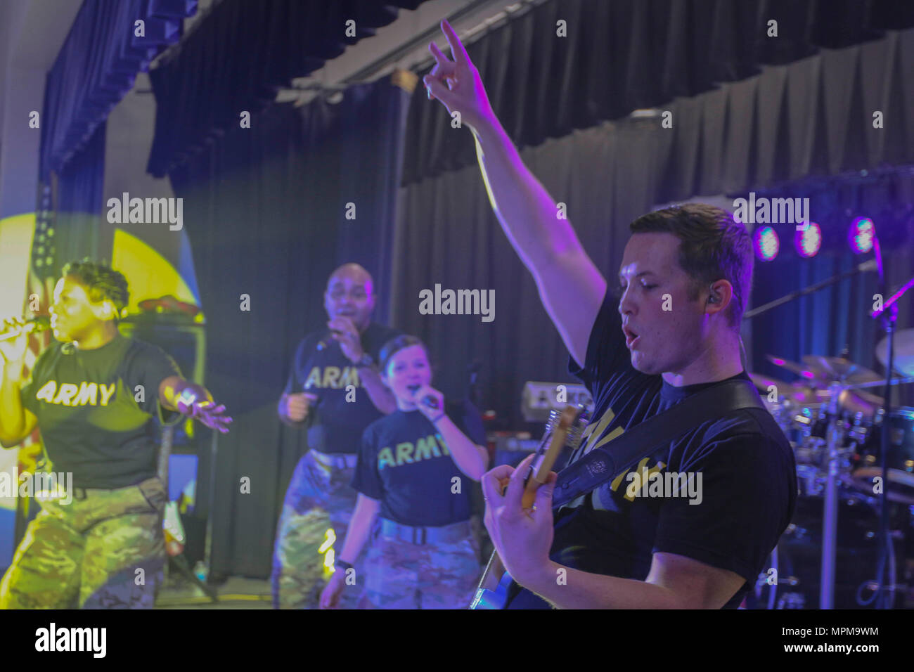 Staff Sgt. Gunnar Kalstrom, right, is introduced by band mates during a ...