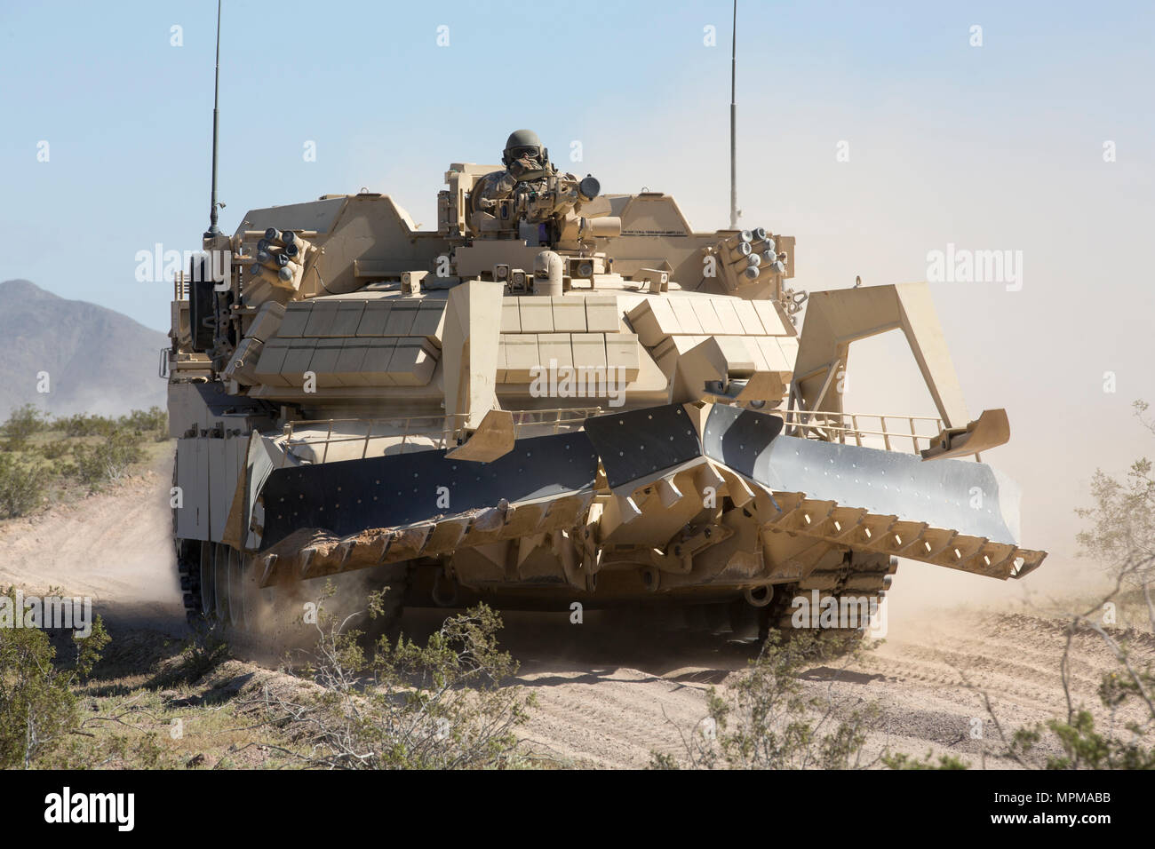 An Assault Breacher Vehicle crosses in onto Marine Corps Air Ground ...