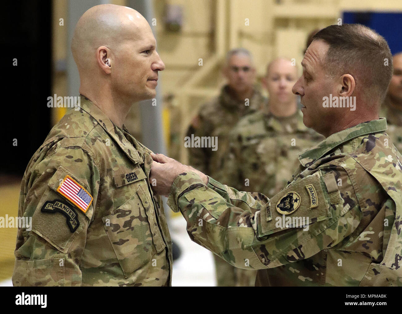 U.S. Army Alaska Commanding General Maj. Gen. Bryan Owens awards the ...