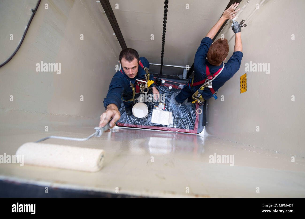 Gunner’s Mate 3rd Class Zachary Larkin (left), from Montrose, Michigan ...