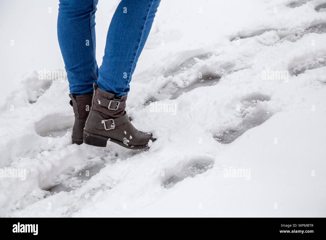 Female legs wearing boots hi-res stock photography and images - Alamy