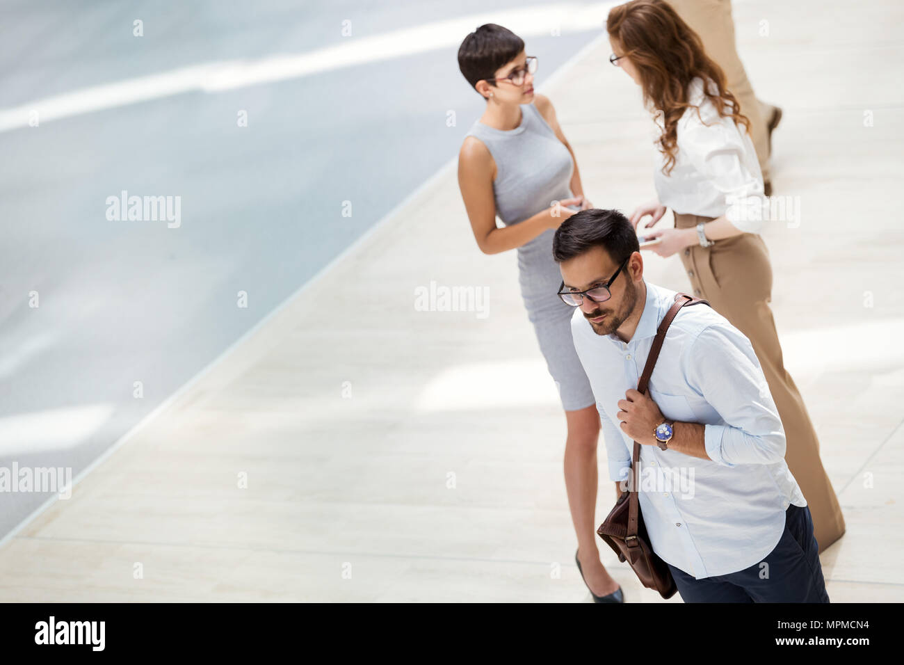 Portrait of businesspeople having free time from work Stock Photo - Alamy