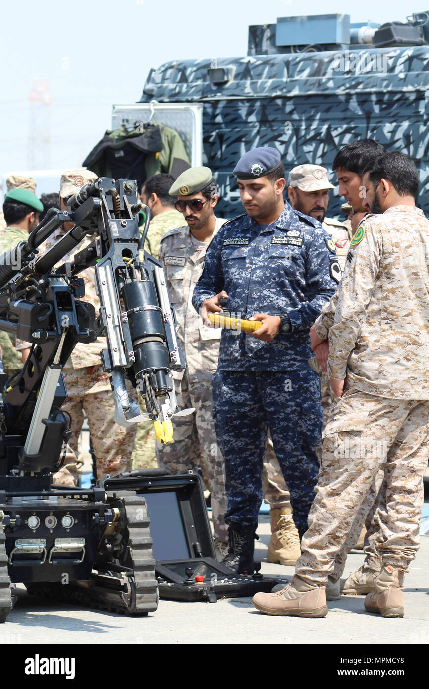 An explosive ordnance disposal specialist with the Kuwait Ministry of ...