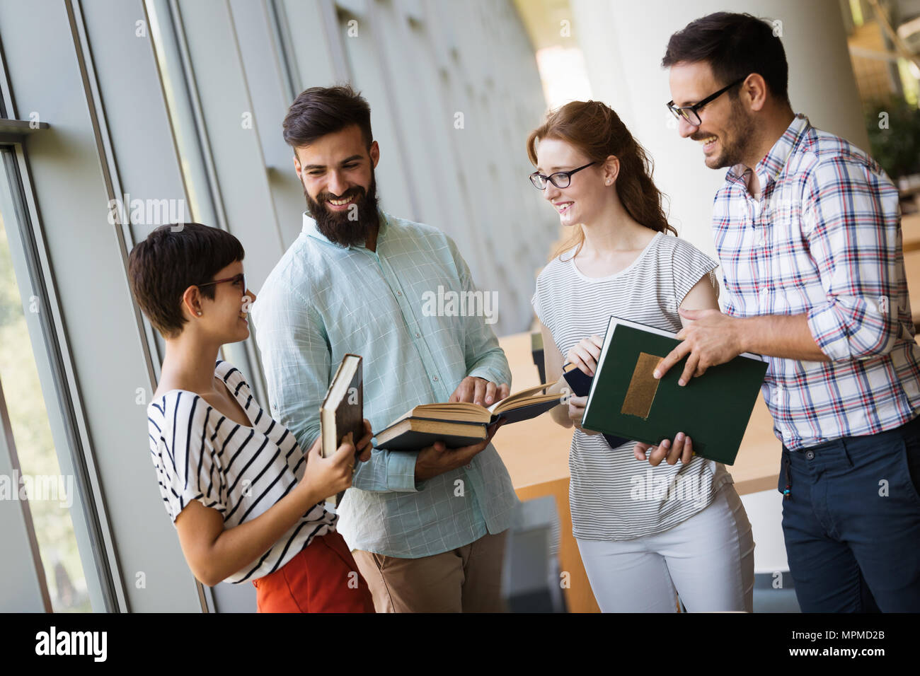 University students talking in class hi-res stock photography and ...