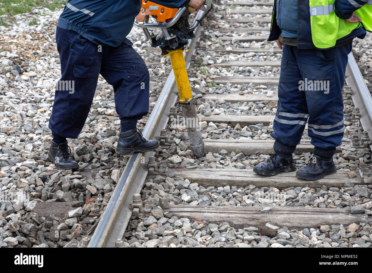 Fixing tracks hi-res stock photography and images - Alamy