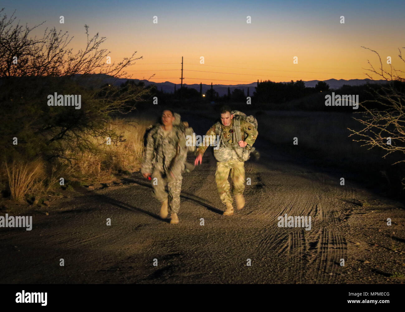 Army Reserve Sgt. Stephen Messenger (right), an information technology ...