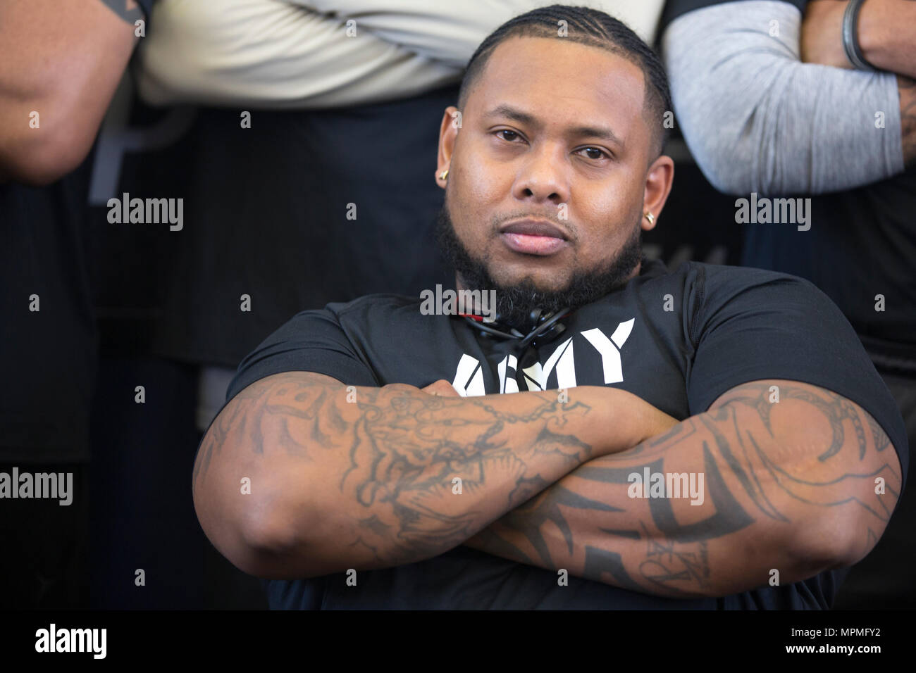 U.S. Army veteran, Isaac Rios, poses in a group photo for the Warrior ...