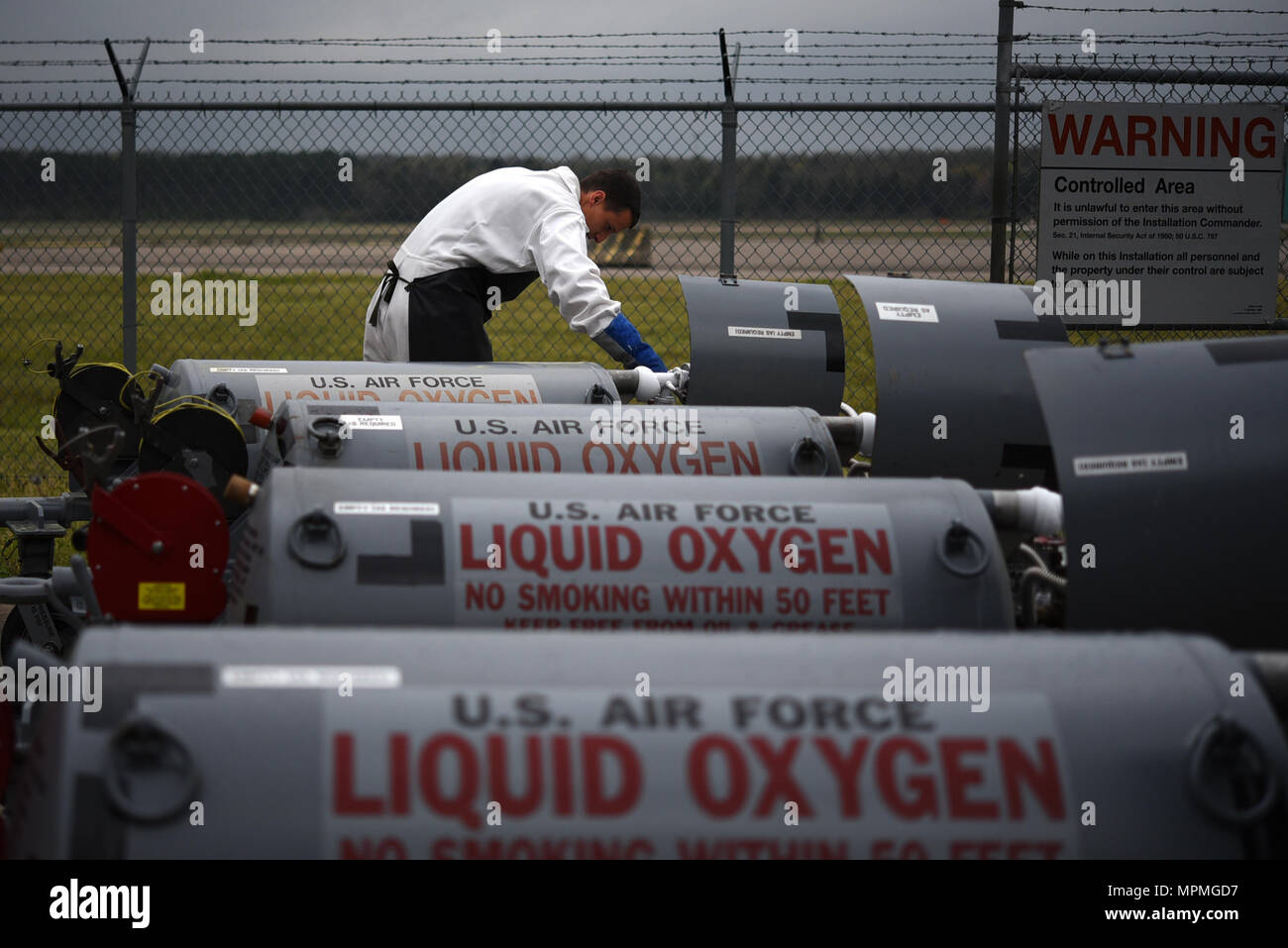 A 19th Logistics Readiness Squadron fuel cryogenics journeyman opens a ...