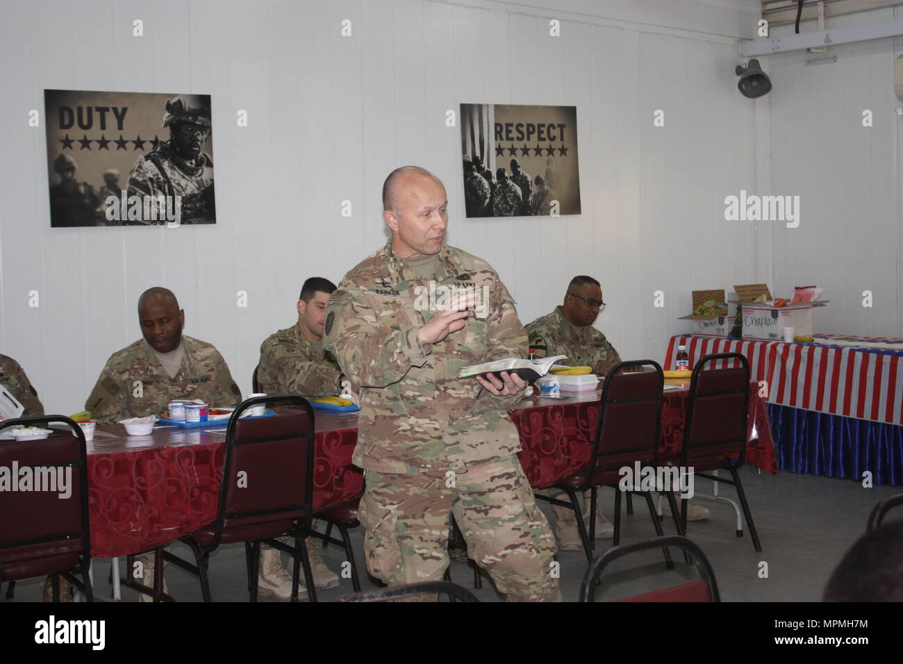 Maj Andrew C. Parker, 595th Transportation Brigade Chaplain, speaks to ...