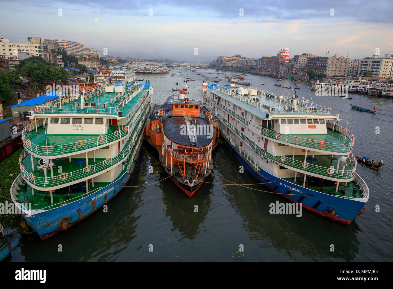 Three BIWTC vessels that ply the Dhaka-Morhelganj route are anchored at ...