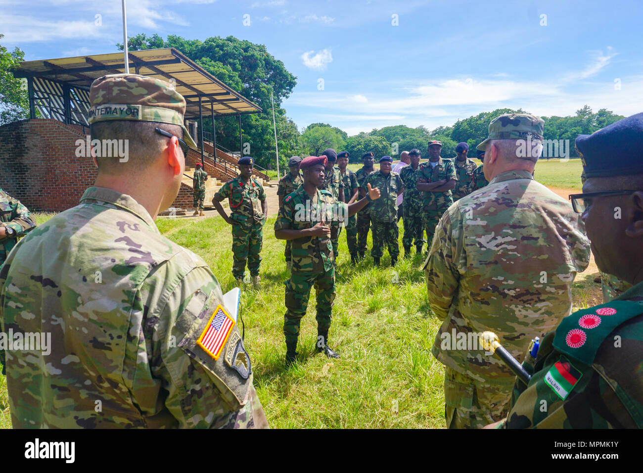 U.S. Army and Malawi Defense Force planners are briefed by a Malawi ...