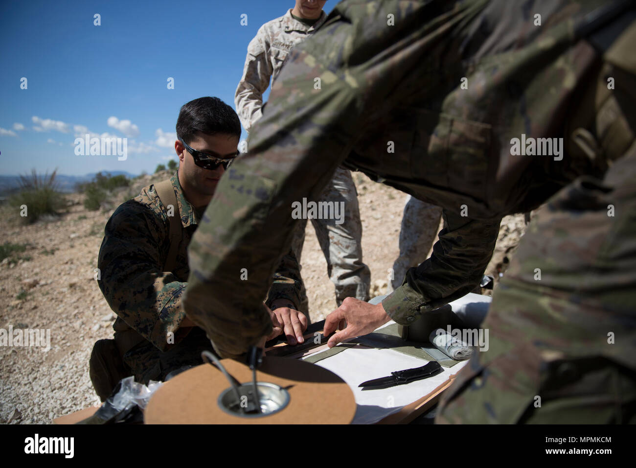 Sgt. Joseph Atilano, an Explosive Ordnance Disposal Technician assigned ...