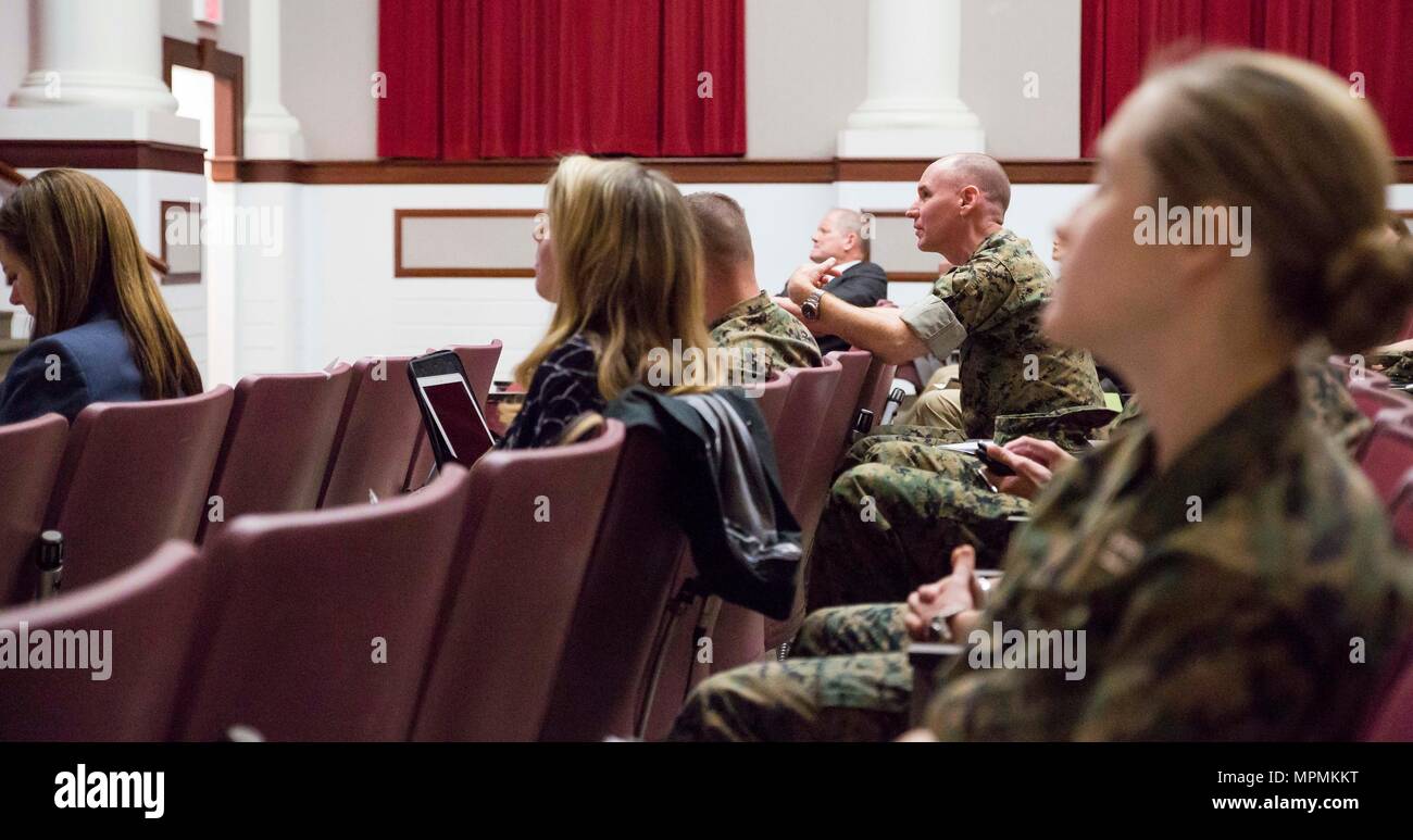 Marines and civilians participate in conversations during a Social ...