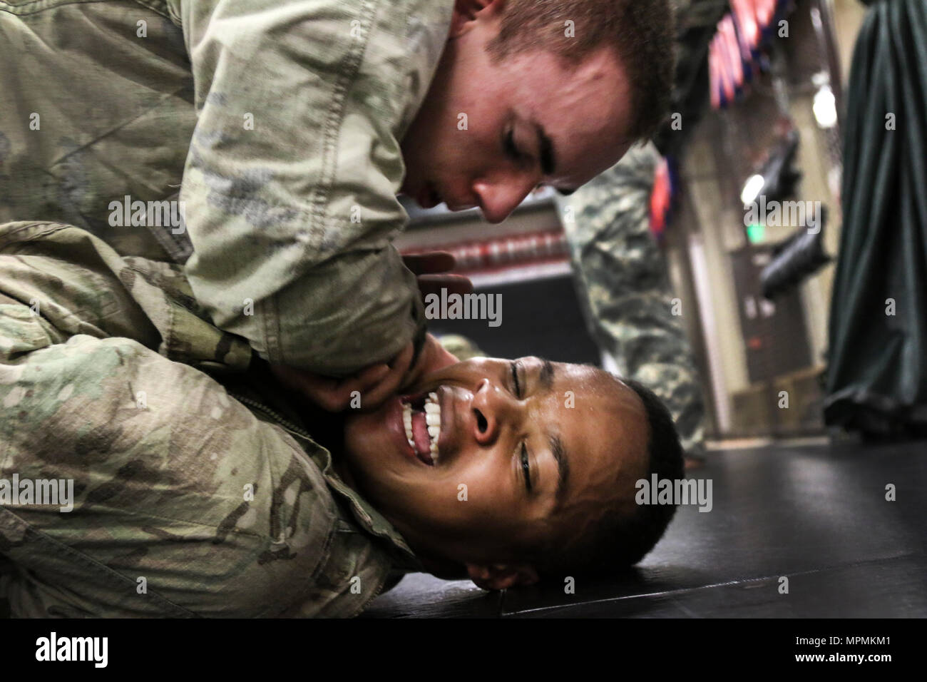 Sgt. Aaron Cochran (bottom), a culinary specialist with 3rd Special ...