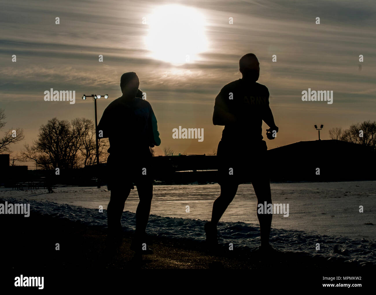 Soldiers conduct the two-mile run portion of the Army Physical Fitness ...