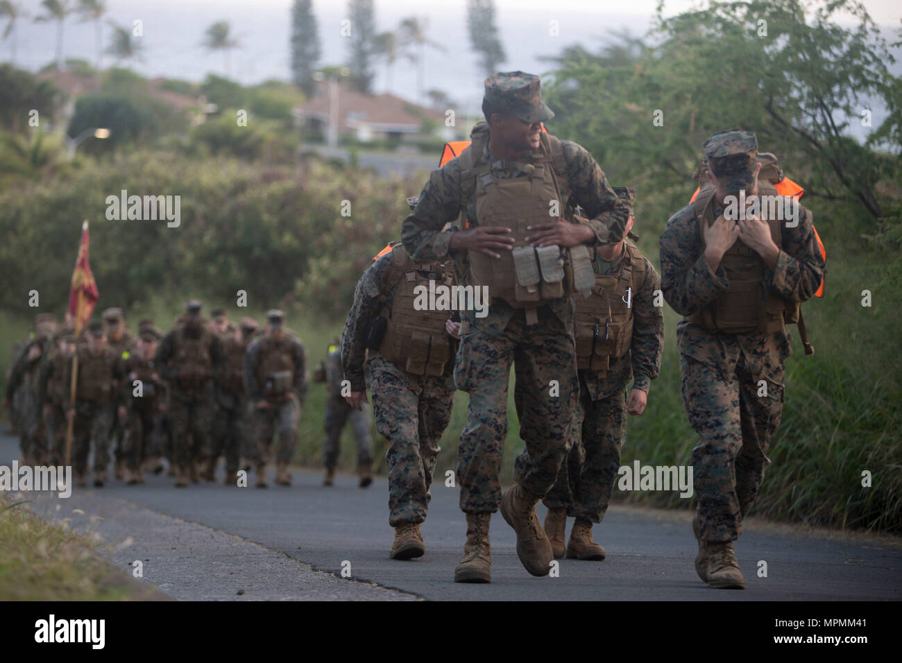 Marines with Alpha Company, 3rd Radio Battalion hike up Kansas Tower ...