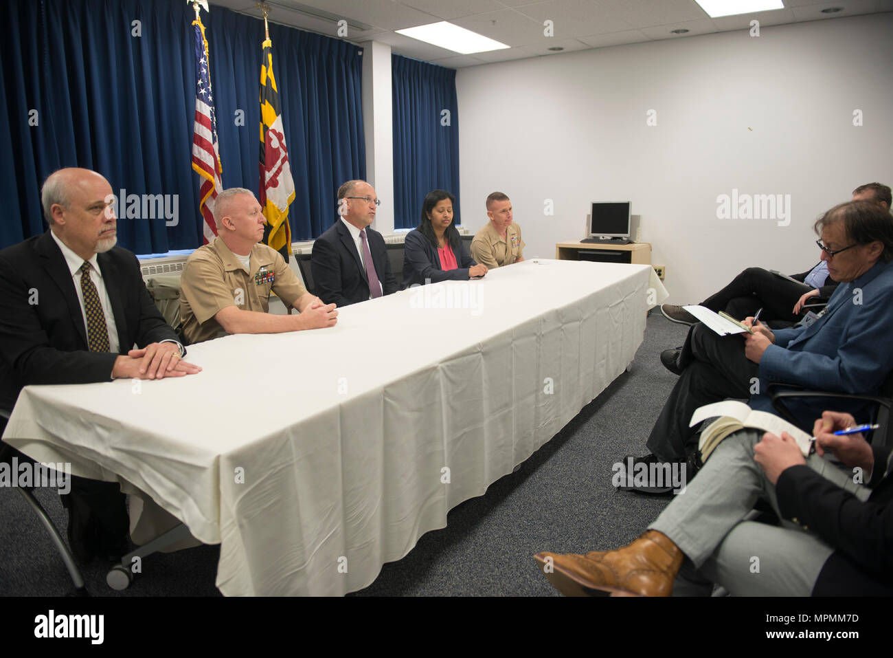 A panel discussion taking place at the Northrop Grumman facility during ...