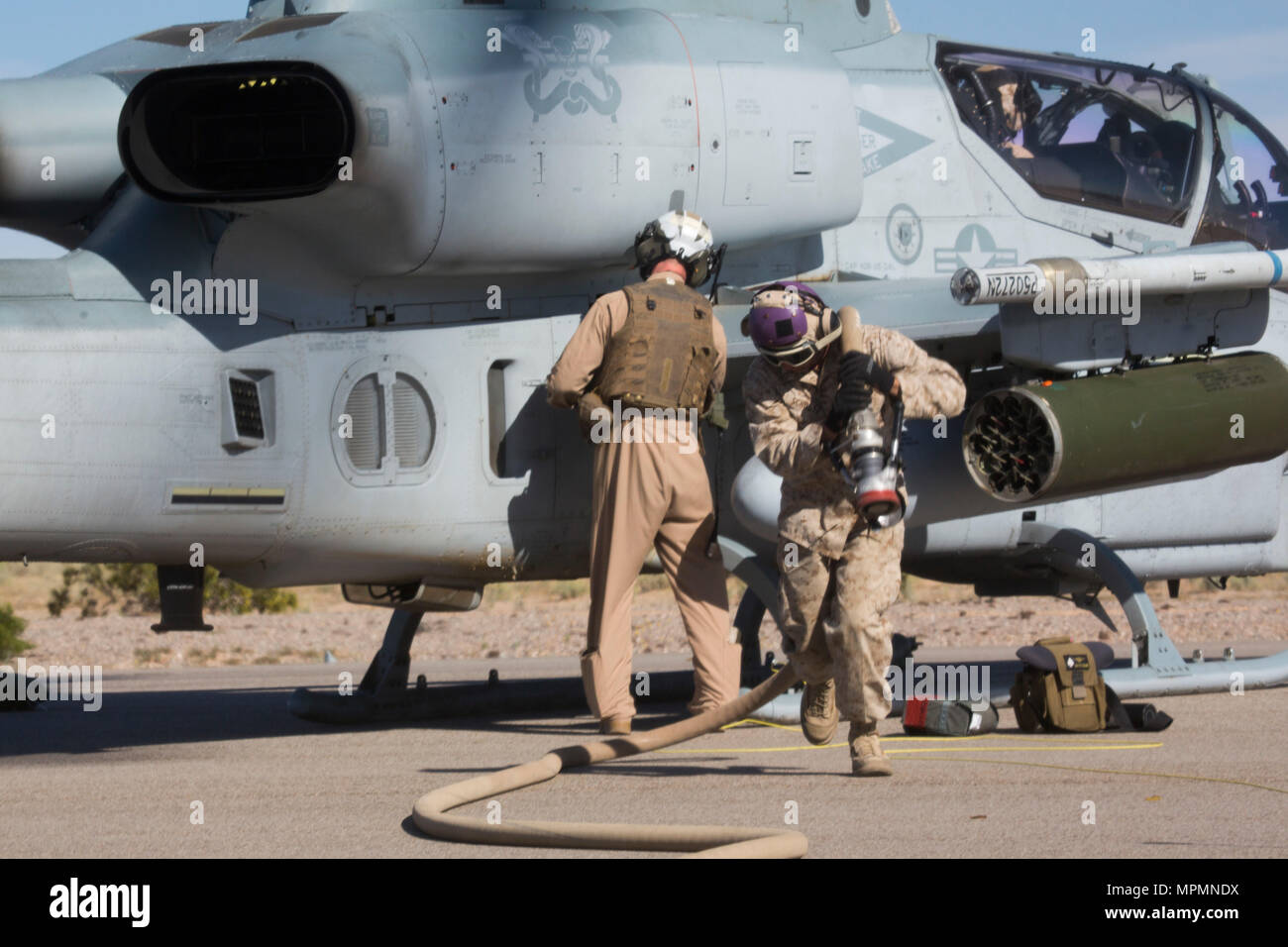 U.S. Marine Corps Private First Class Wesley Schultz, nozzle operator ...