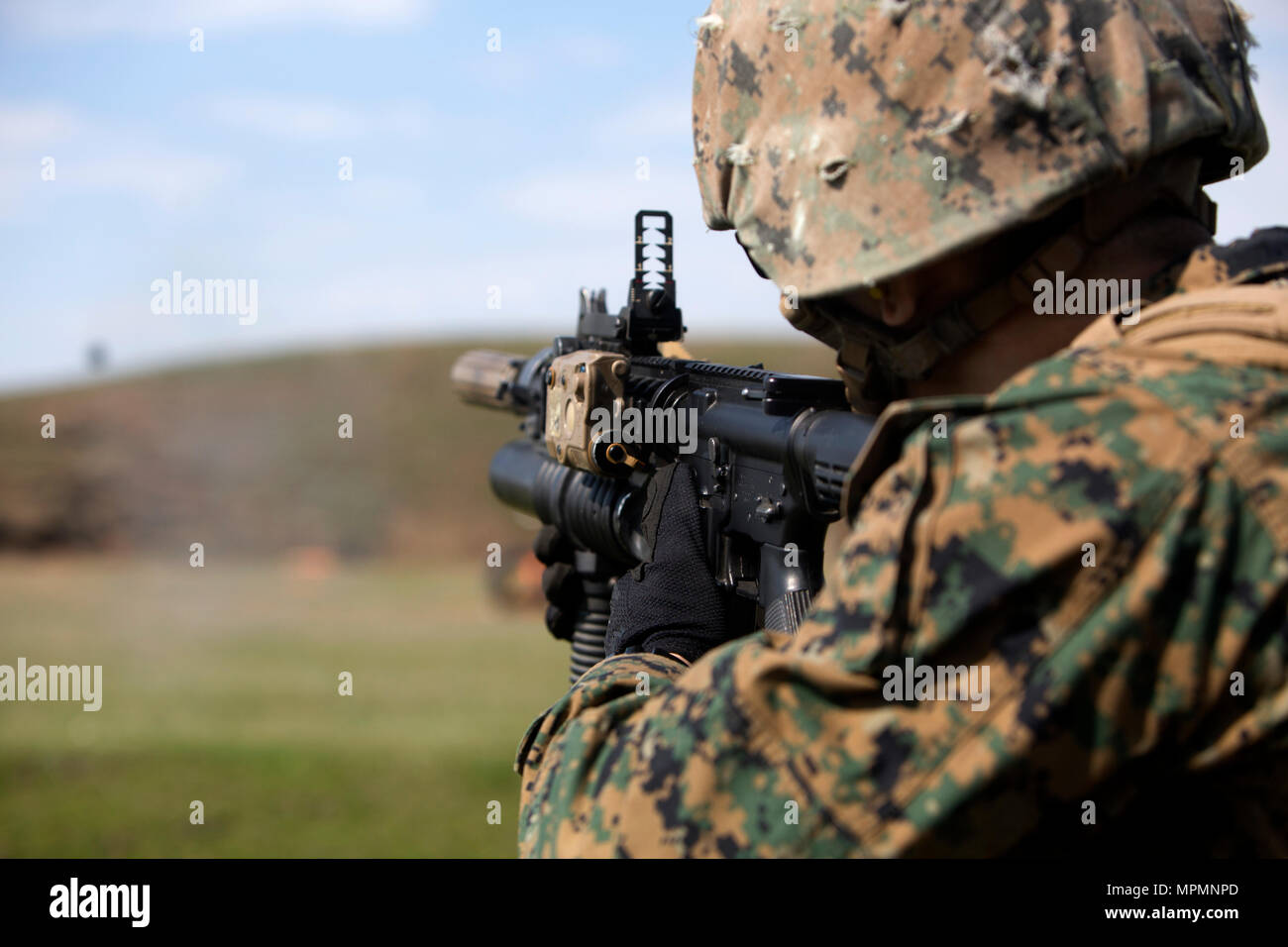 A U.S. Marine with the Black Sea Rotational Force shoots the M203 ...