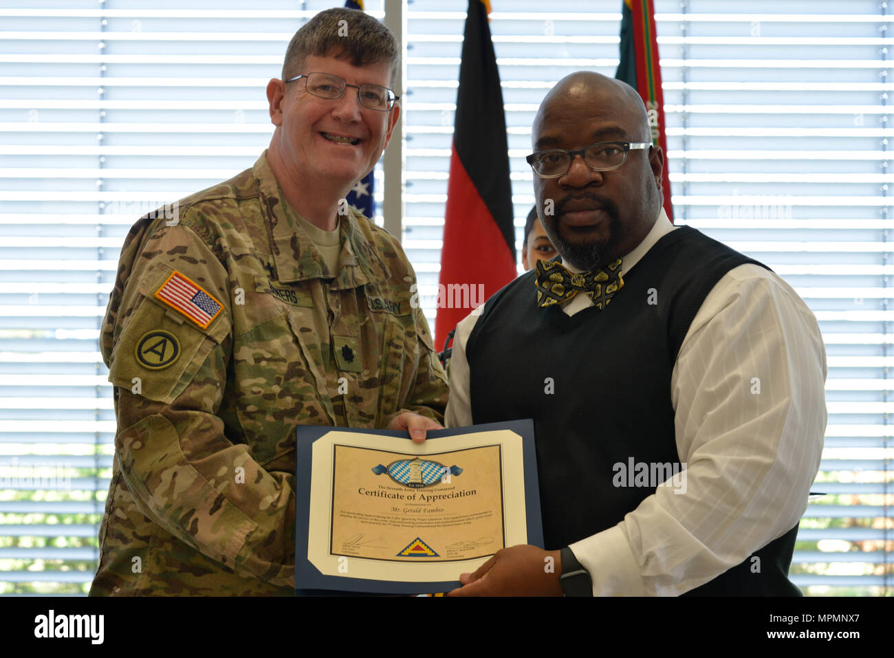 U.S. Army Lt. Col. Tom Bowers (left), 7th Army Training Command’s ...