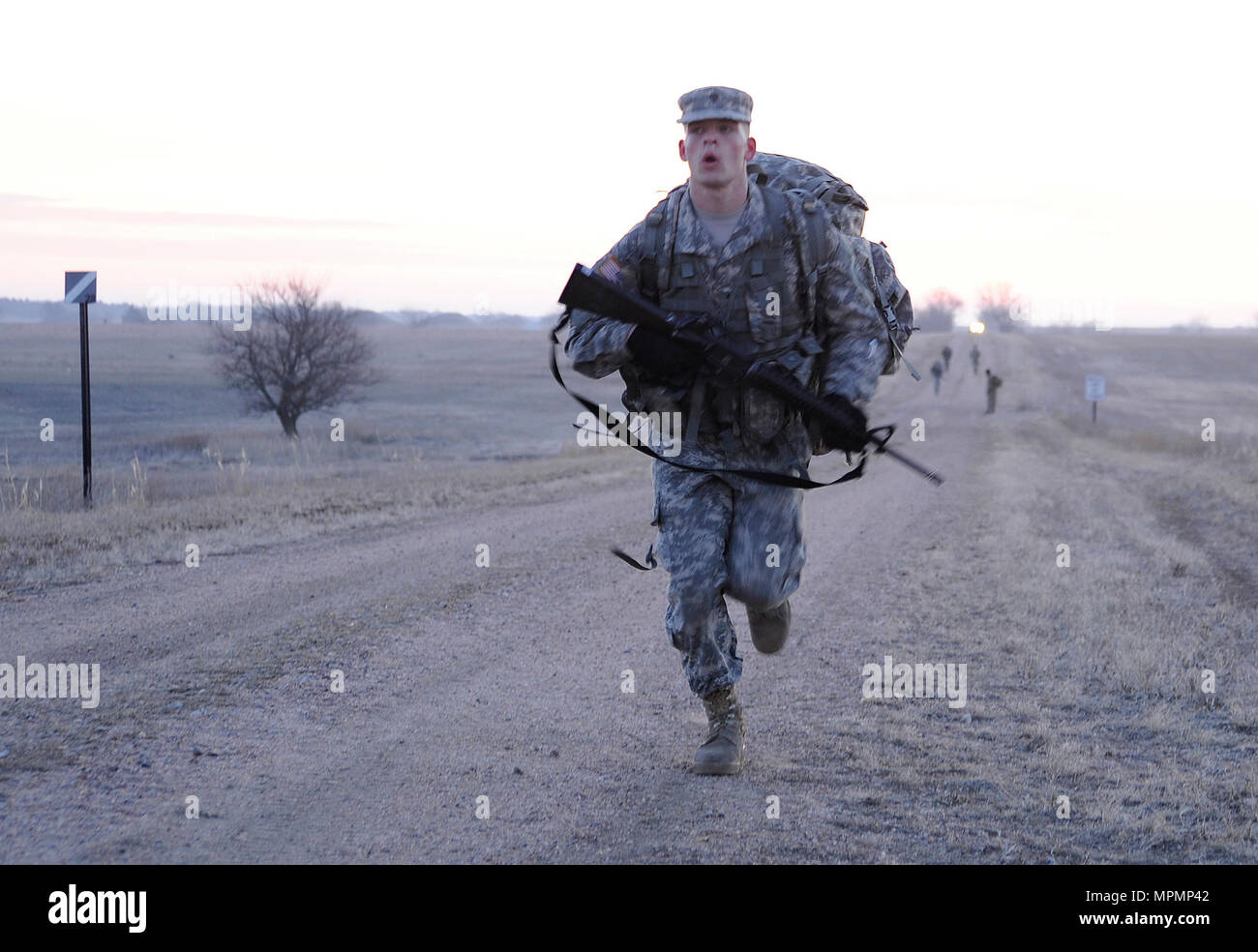 A Nebraska National Guard 2017 Best Warrior competition Soldier runs ...