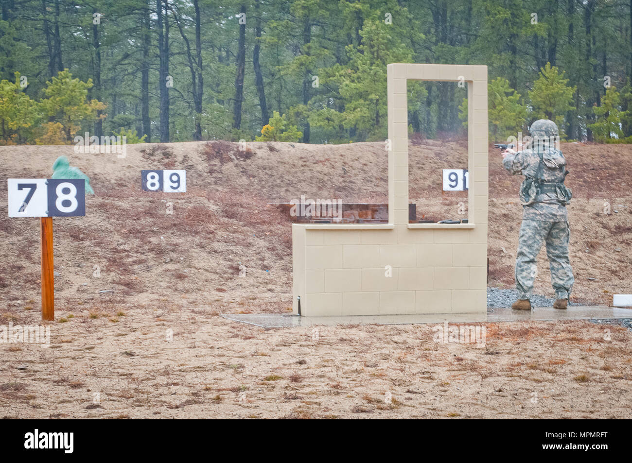 Soldier hits target during the marksmanship portion of the Best Warrior ...