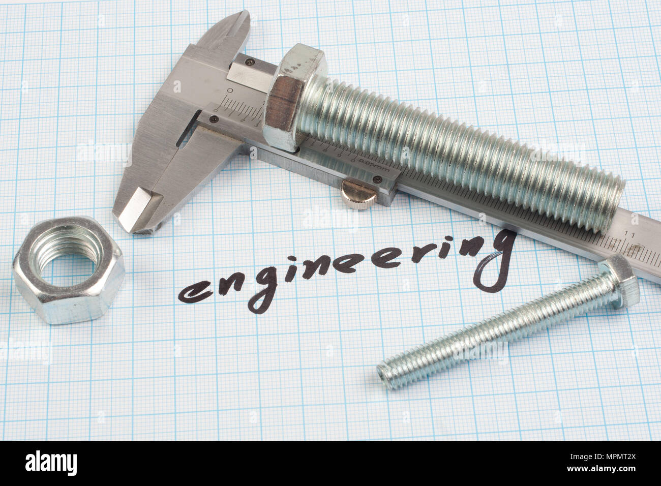 "engineering" - Screw and Nuts on graph paper background Stock Photo ...