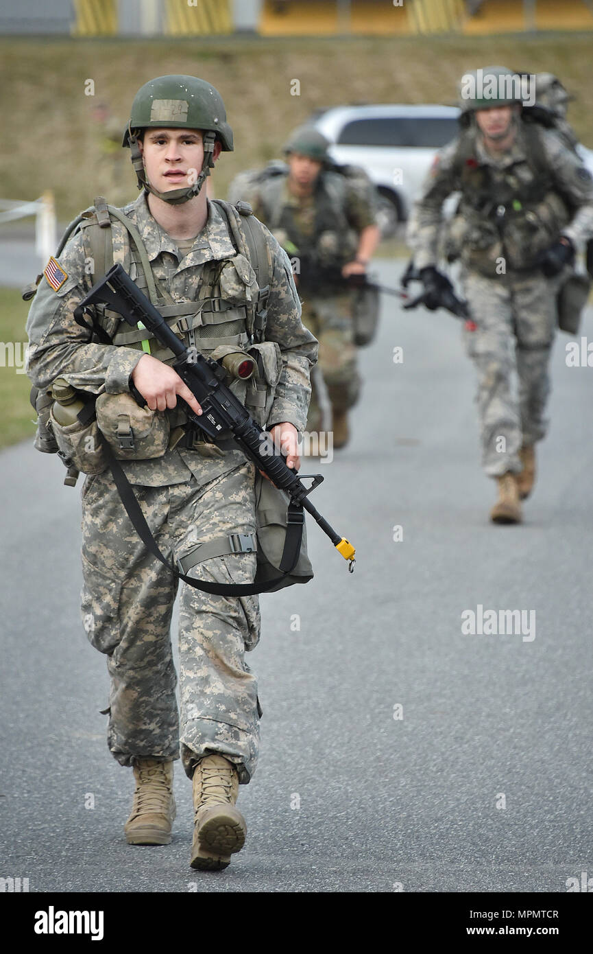 A U.S. Soldier conducts a 12 mile ruck march during the U.S. Army ...