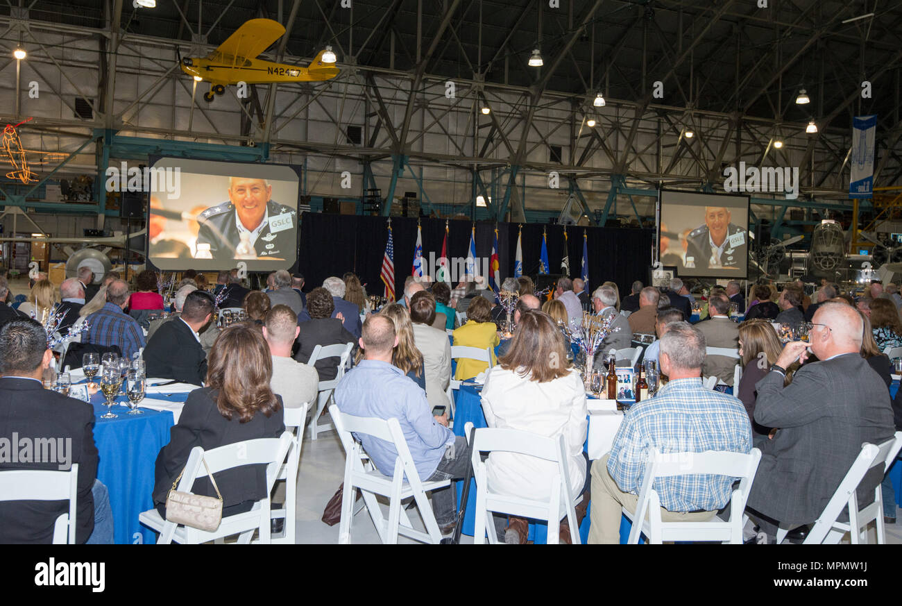 An audience watches a video dedicated to United States Air Force Maj ...