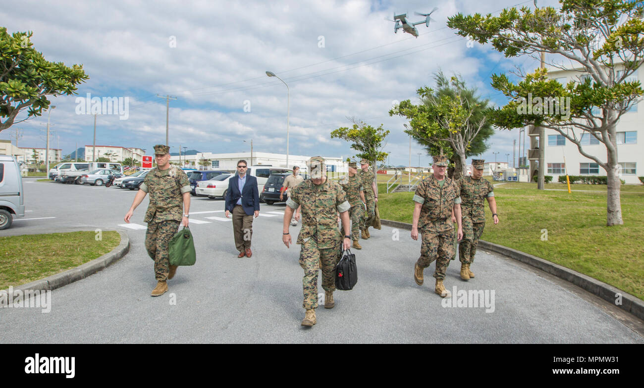 Commandant of the Marine Corps Gen. Robert B. Neller walks to a town ...