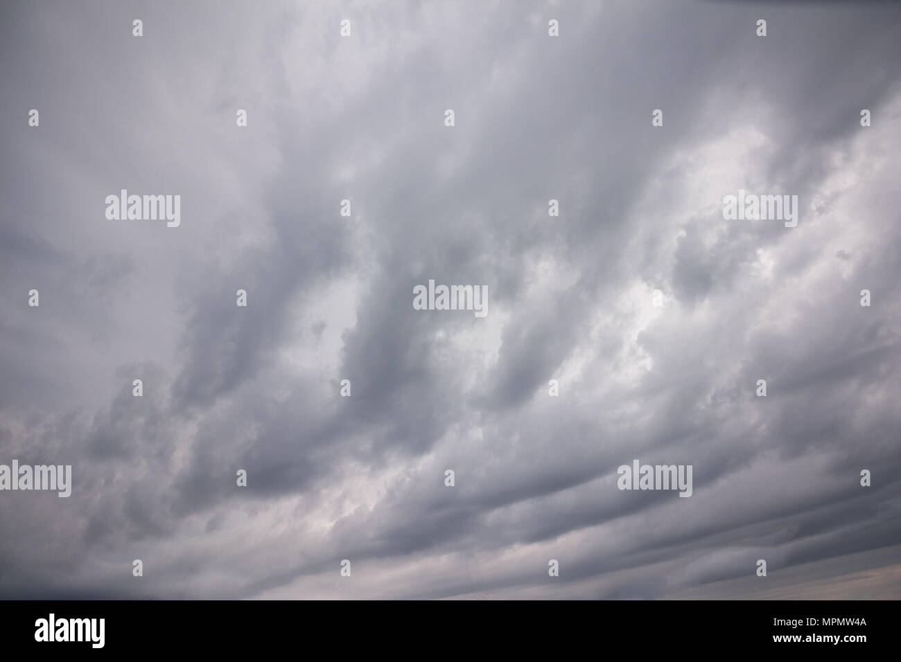 Beautiful rain clouds in the evening sky. Background Stock Photo - Alamy