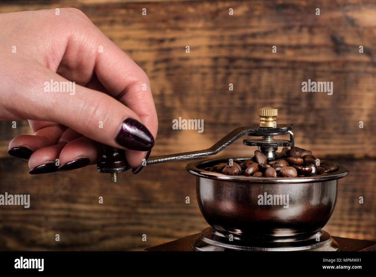 Hand grinding hi-res stock photography and images - Alamy