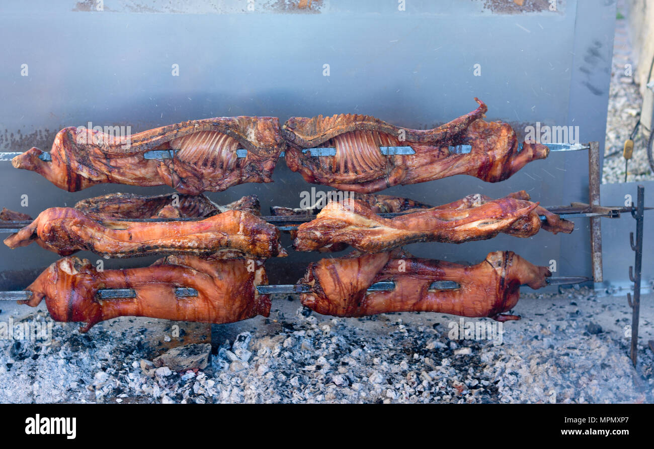 Spit-roasted meat very appetizing Stock Photo - Alamy
