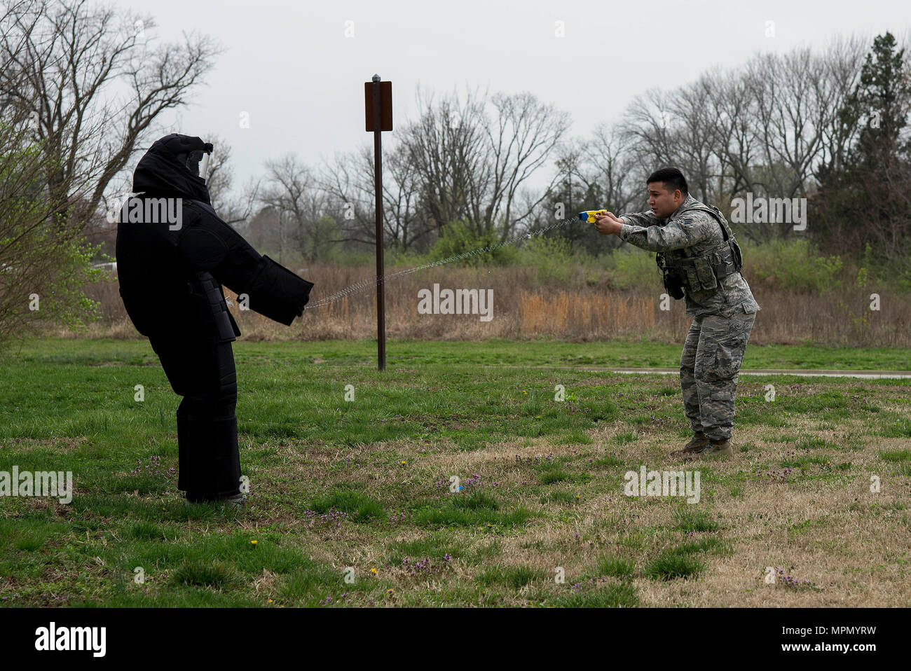 Senior Airman Leonardo Reyes Jr. (right), 375th Security Forces ...