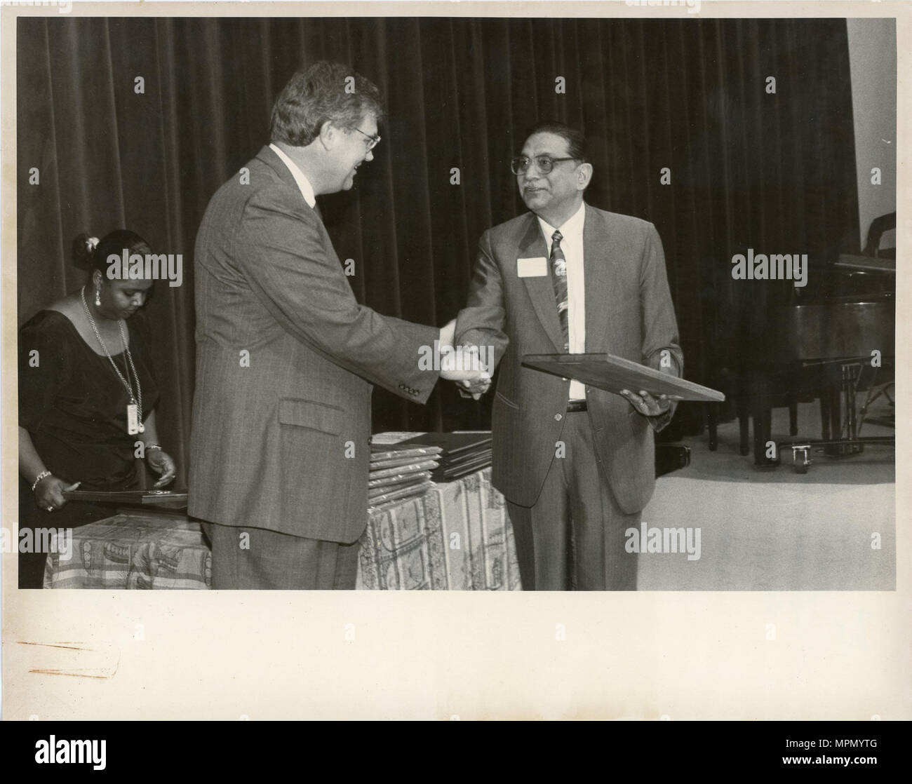 man receiving award from man Stock Photo - Alamy