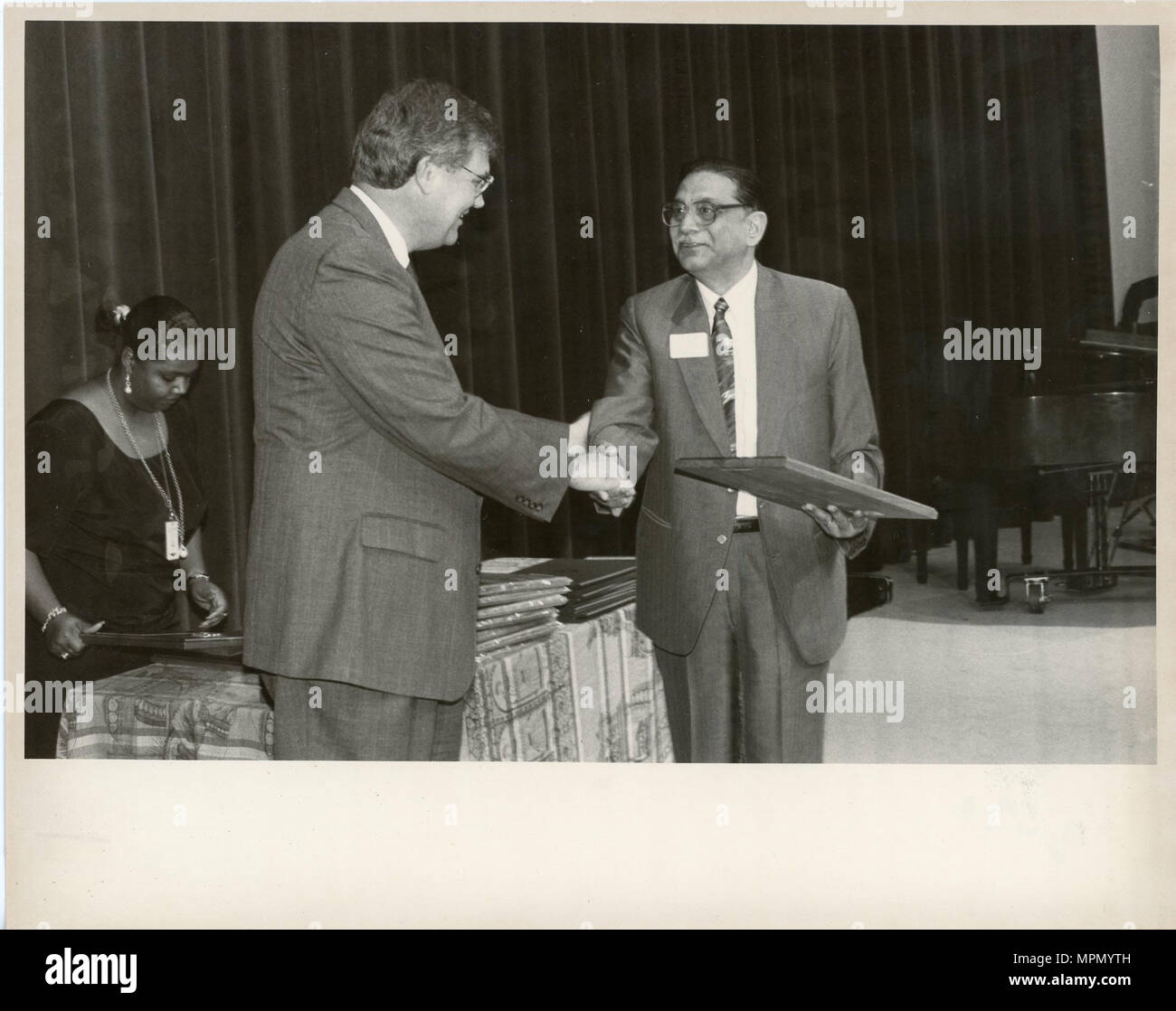 man receiving award from man Stock Photo - Alamy