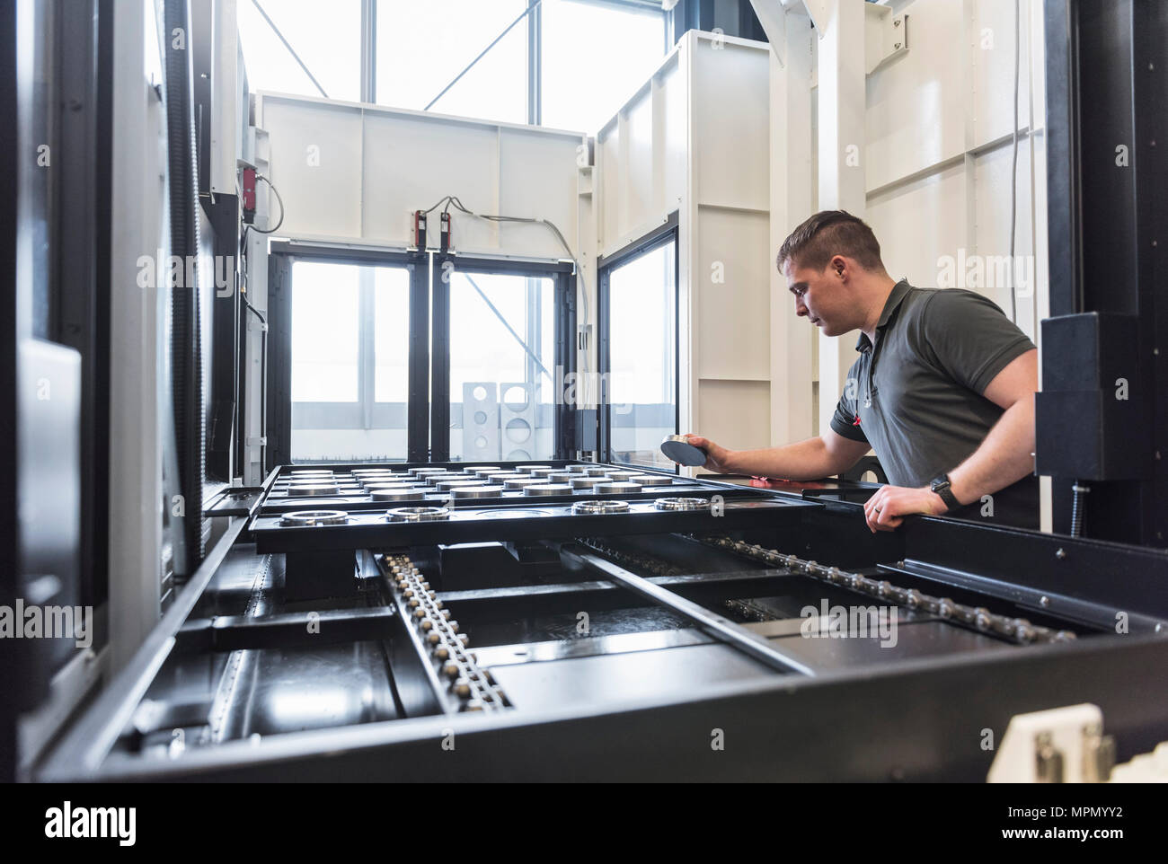 Back view factory workers in hi-res stock photography and images - Alamy