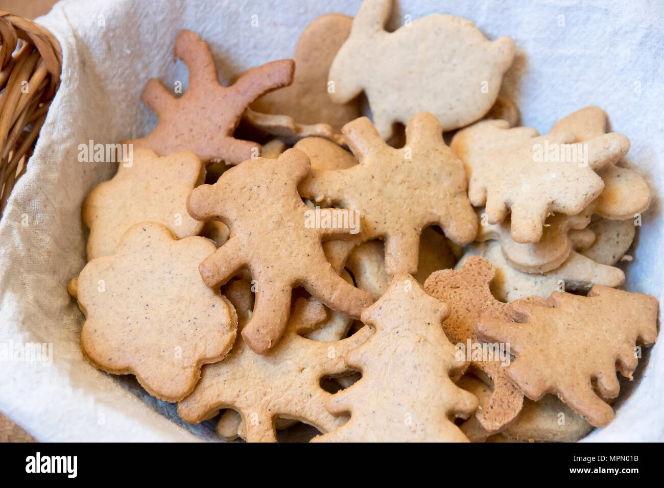 Ginger biscuits in basket on white background Stock Photo - Alamy