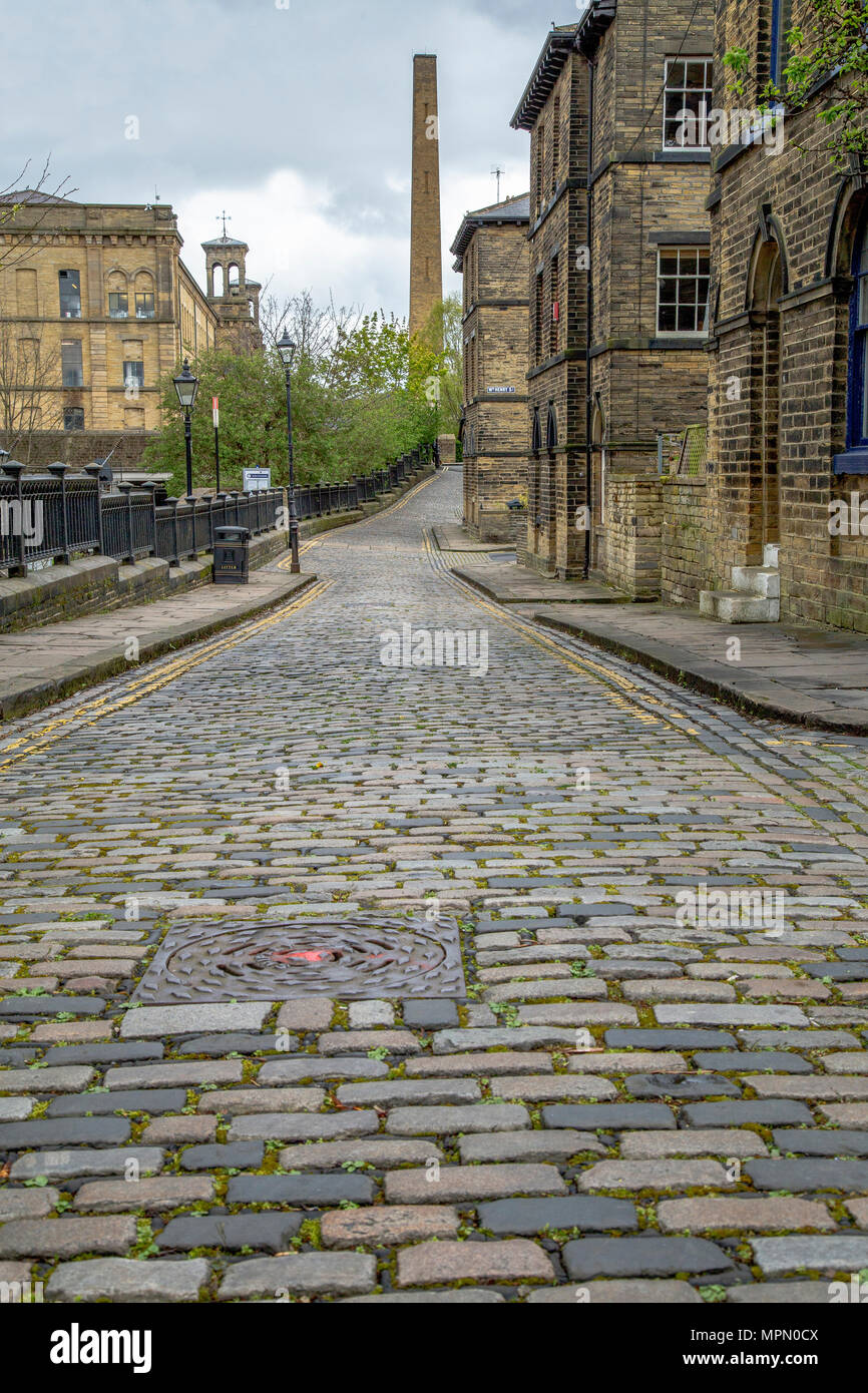 Cobbled streets of Saltaire village in West Yorkshire. Saltaire is a ...