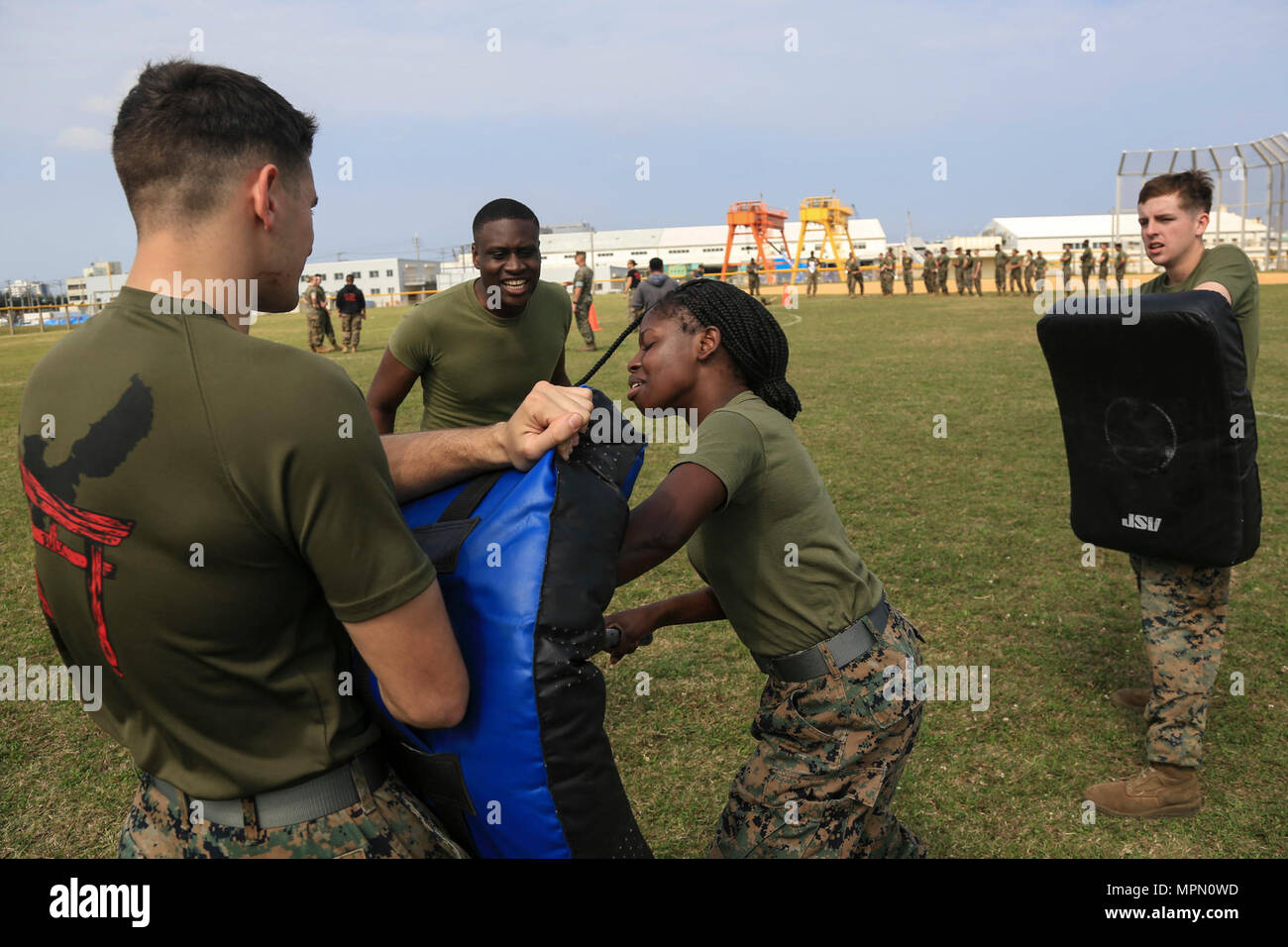 U.S. Marine Corps Lance Cpl. Jesula Jeanlouis, combat photographer ...