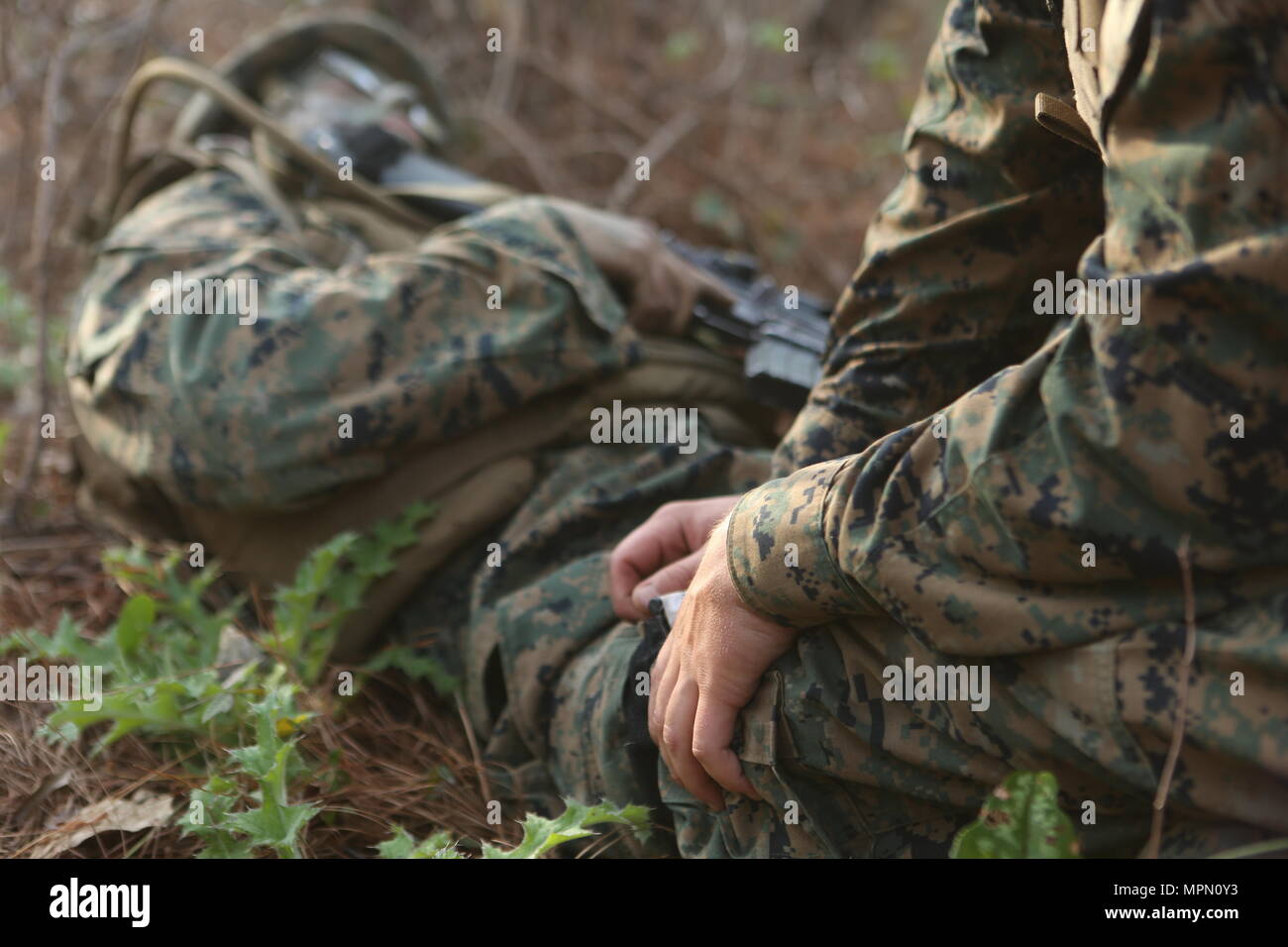 A U.S. Marine, with Headquarters Regiment, 2nd Marine Logistics Group ...