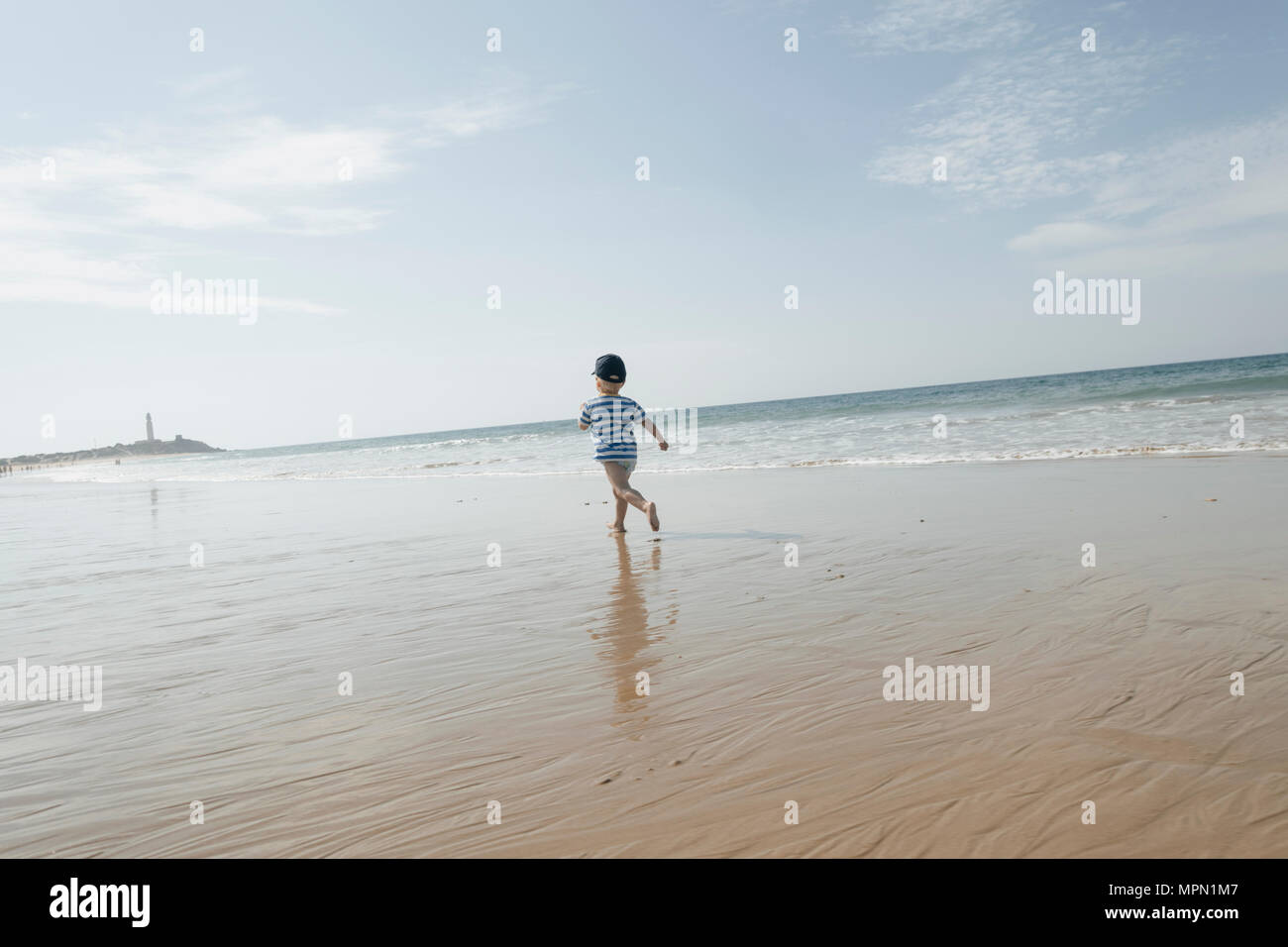 Boy 2 3 running on beach hi-res stock photography and images - Alamy