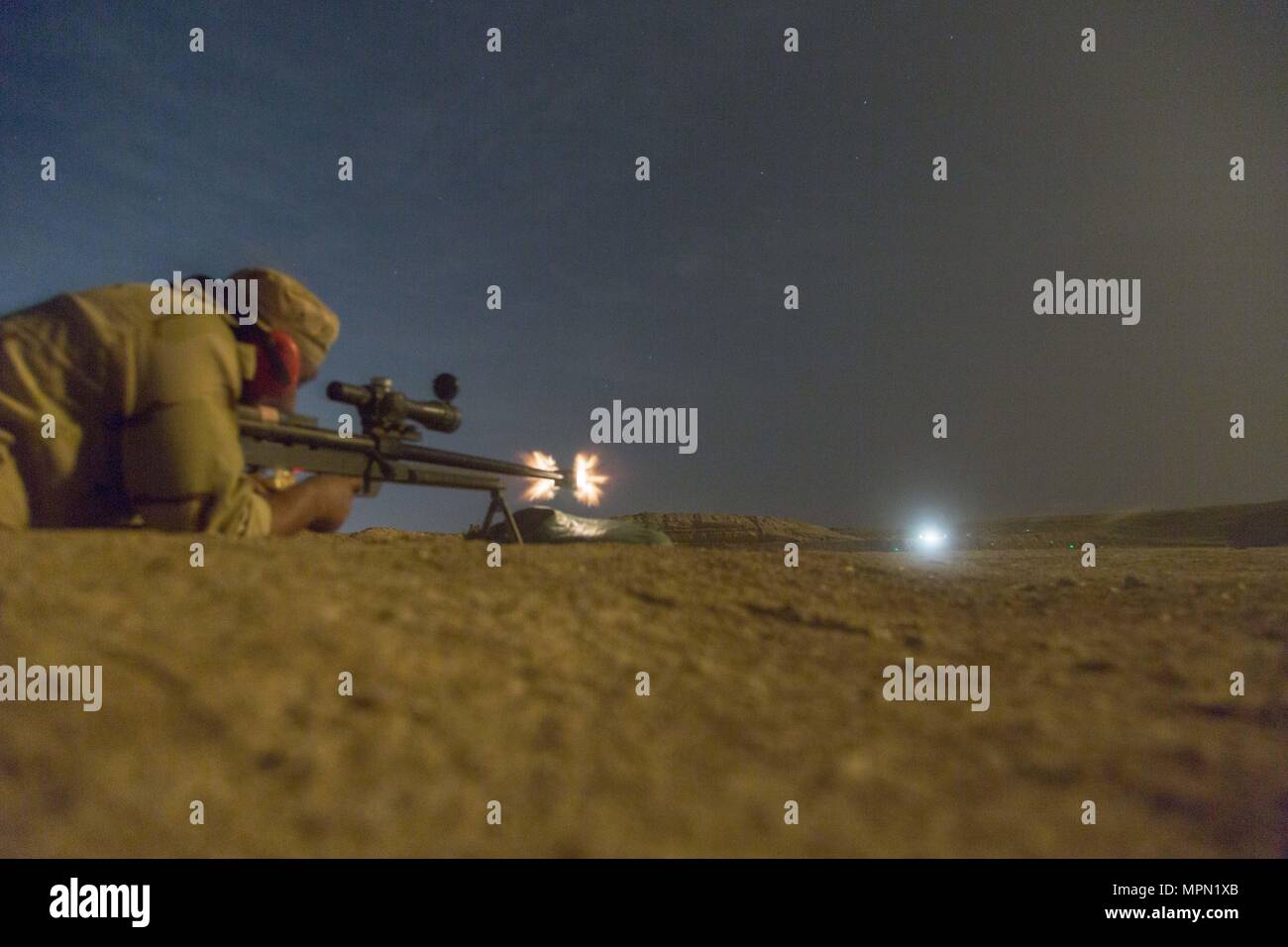 An Iraqi security forces soldiers fires a Steyr HS-50 sniper rifle ...