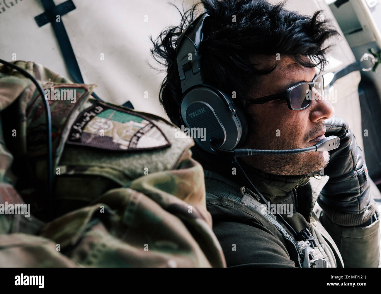 An Afghan Air Force member training with Train, Advise, Assist Command-Air, as part of Resolute ...