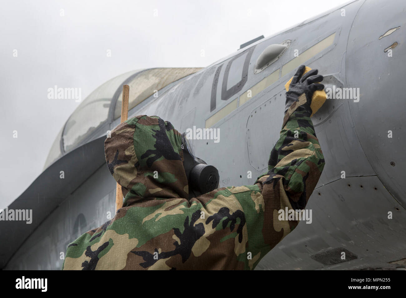 U.S. Marines conduct aircraft decontamination with Marine Fighter ...