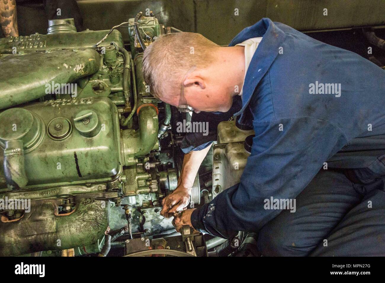 U.S. Airman First Class Devin Johnson, a vehicle mechanic with the ...