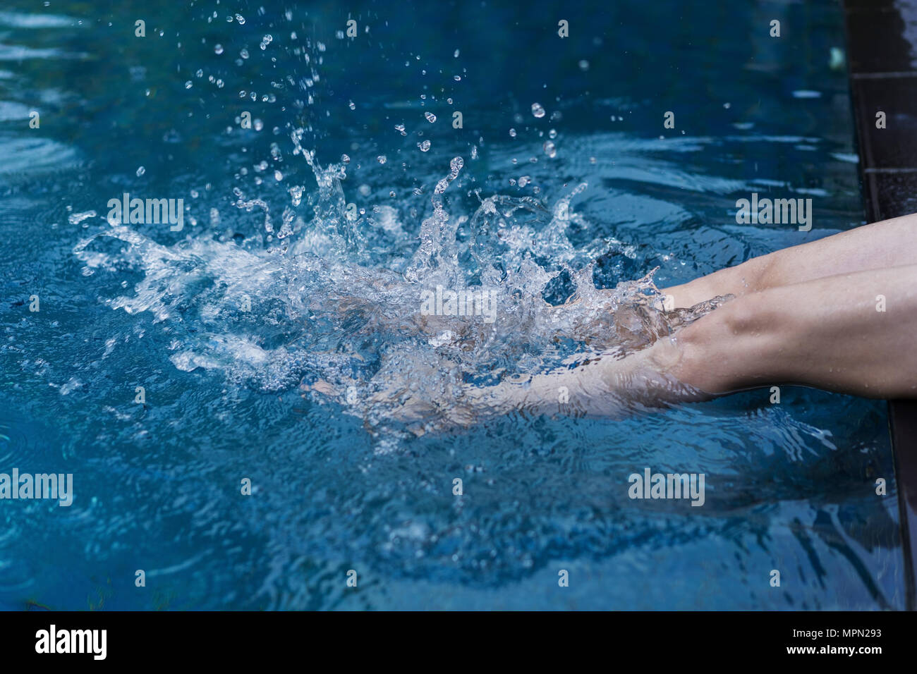 Female legs swimming hi-res stock photography and images - Alamy