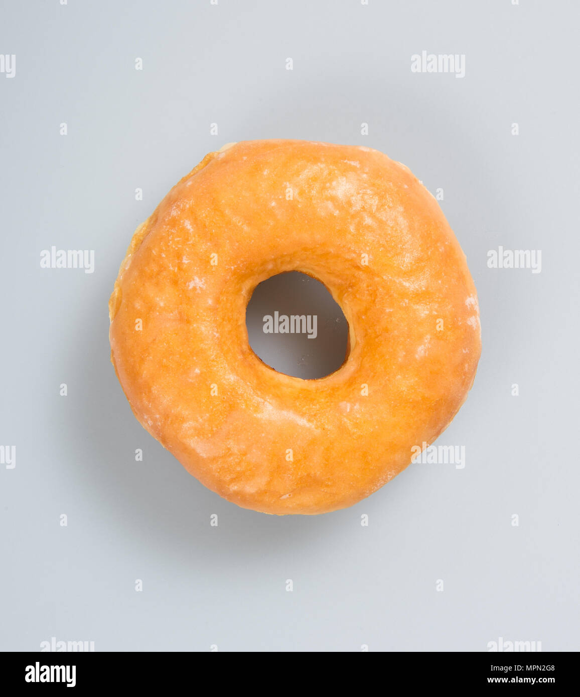 donut or classic donut on a background Stock Photo - Alamy