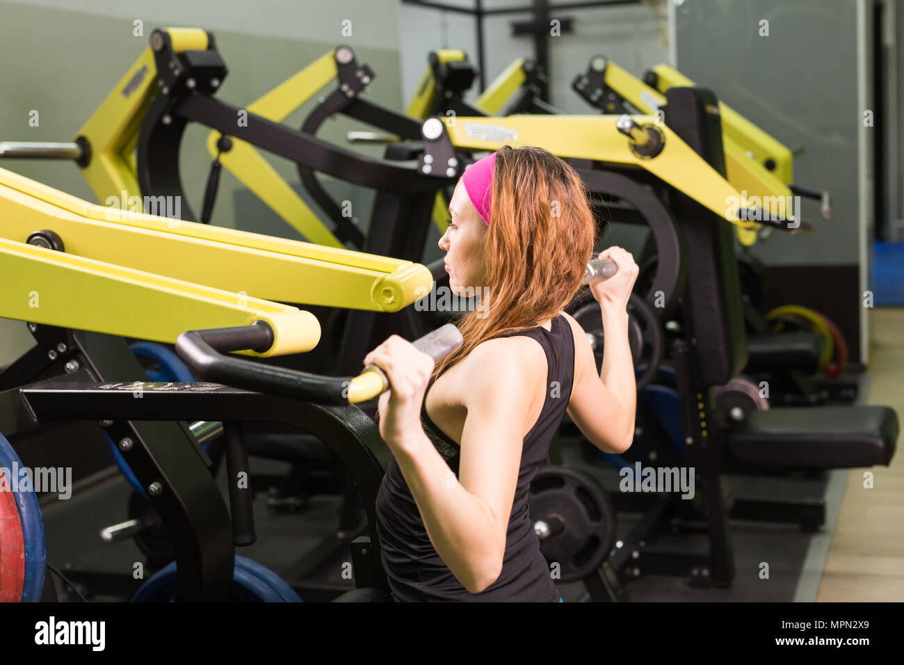 sport, fitness, lifestyle and people concept - Beautiful woman flexing ...